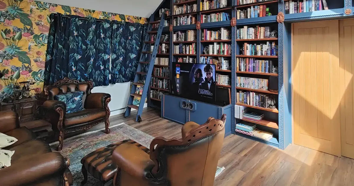 Customer Installation showcase TV lift in a bespoke library